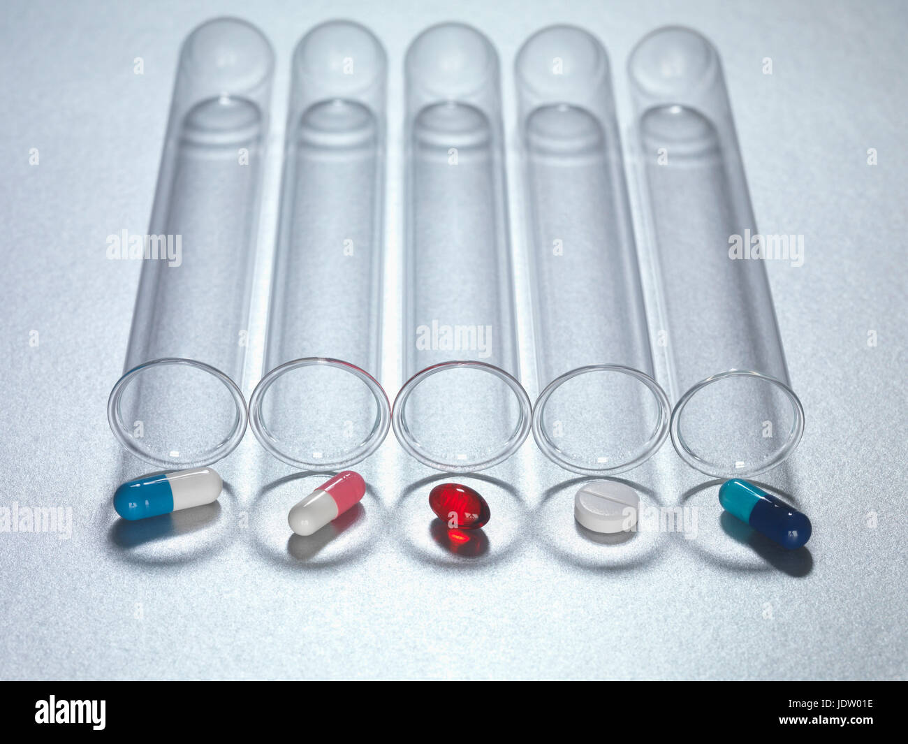 Medicine capsules in test tube Stock Photo - Alamy