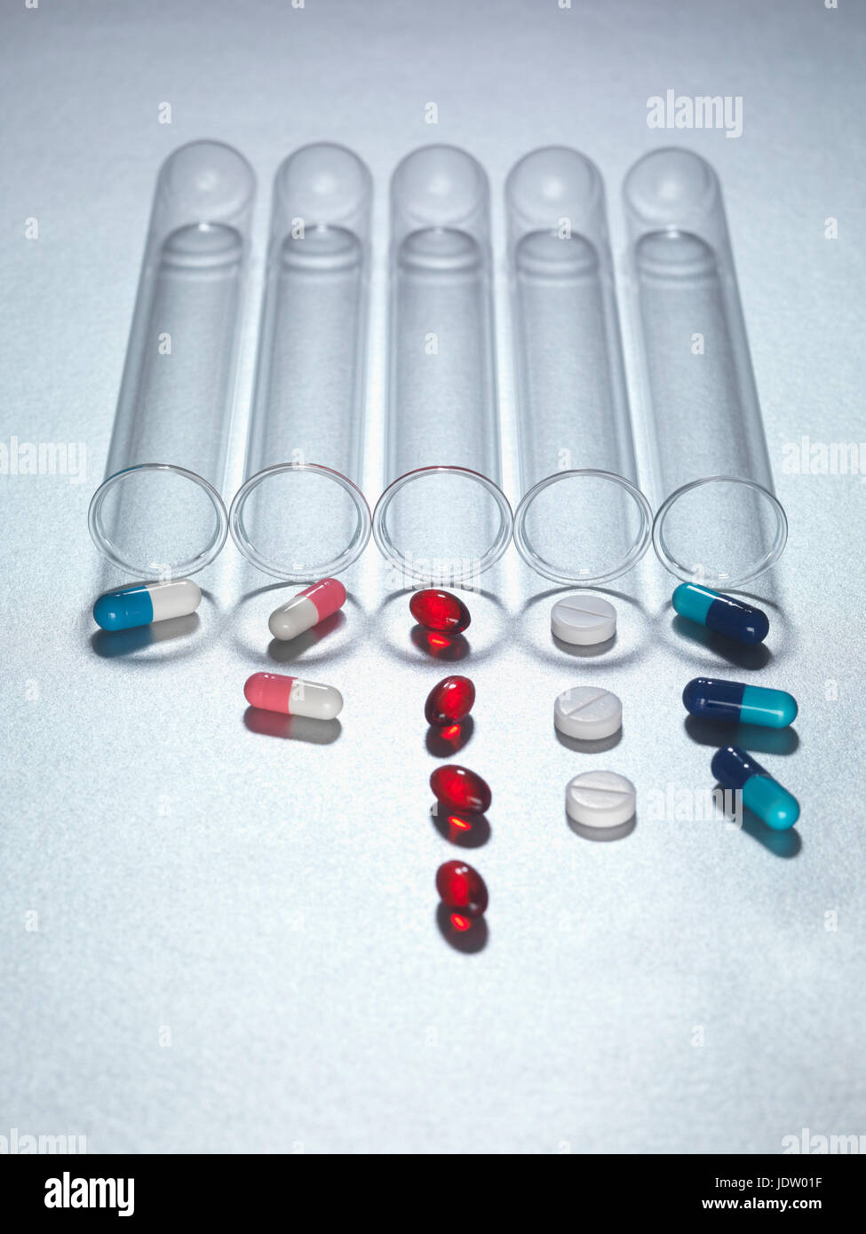 Medicine capsules in test tube Stock Photo - Alamy