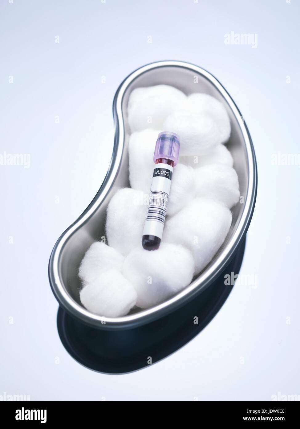 Blood sample and cotton balls in bowl Stock Photo - Alamy