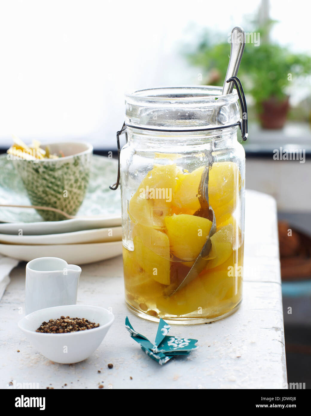 Jar of preserved fruit on table Stock Photo - Alamy