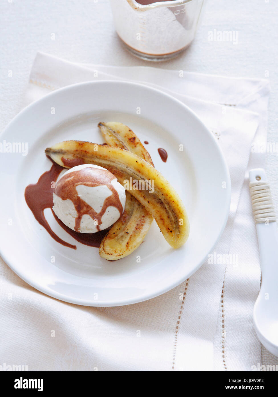 Plate of fried bananas with ice cream Stock Photo - Alamy