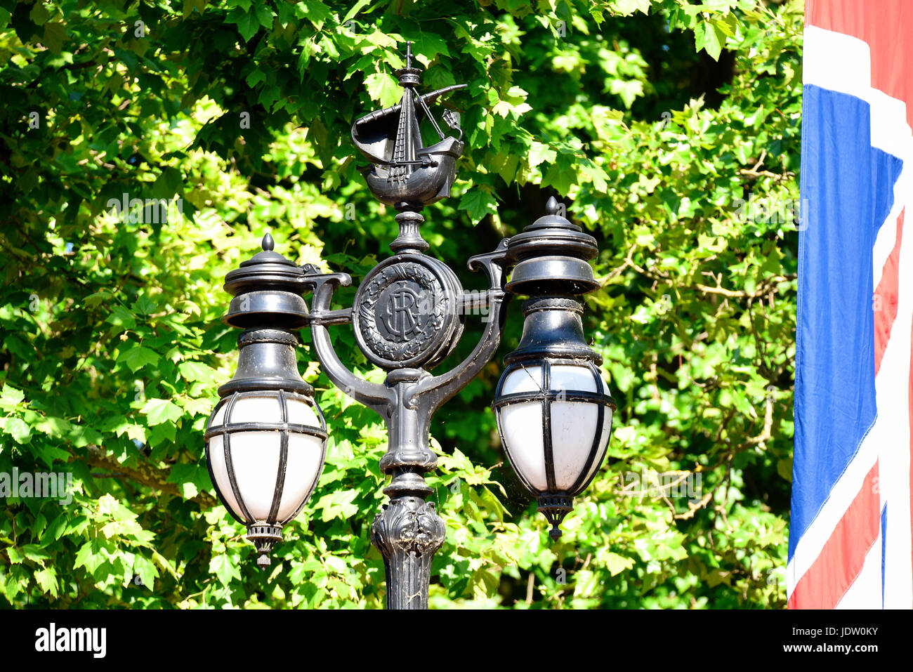 Decorated lamps lining The Mall London with galleon with the G I R ...