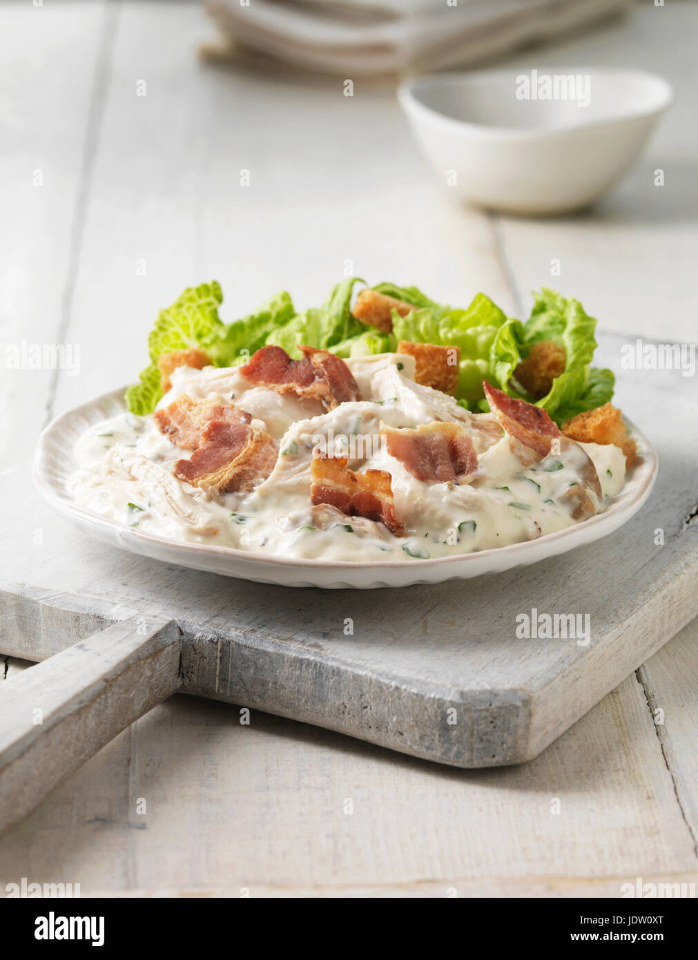 Plate of chicken caesar salad Stock Photo - Alamy