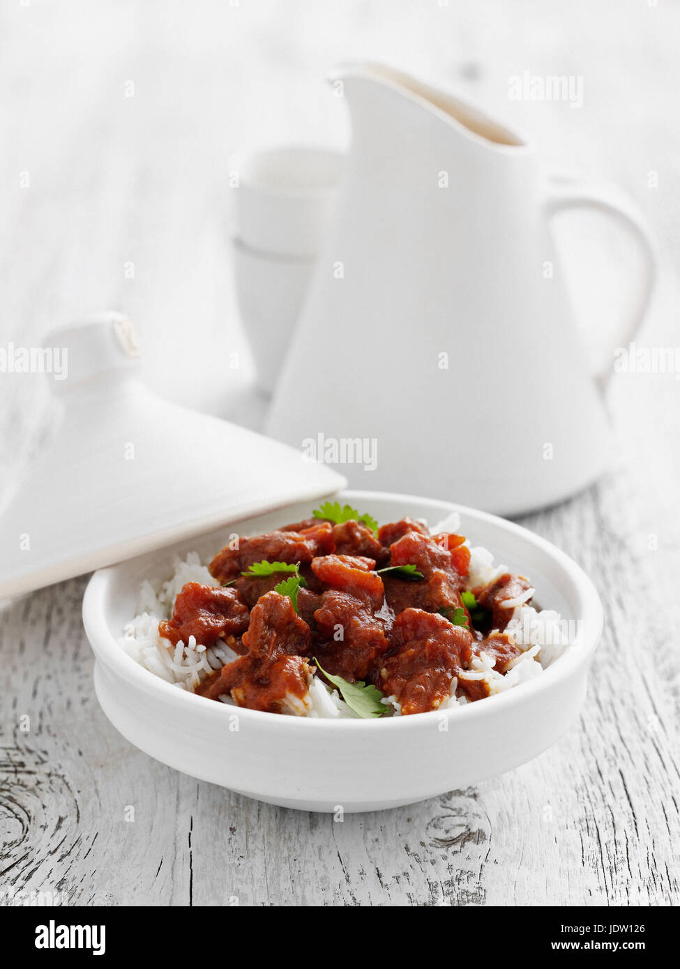 Bowl of meat over rice Stock Photo - Alamy
