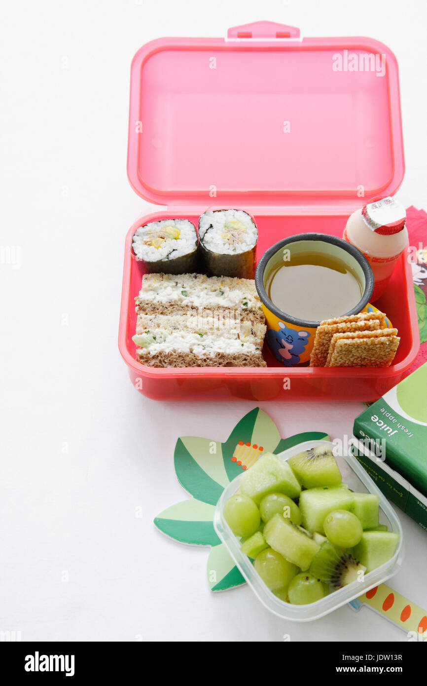 Food packed into lunch box Stock Photo - Alamy