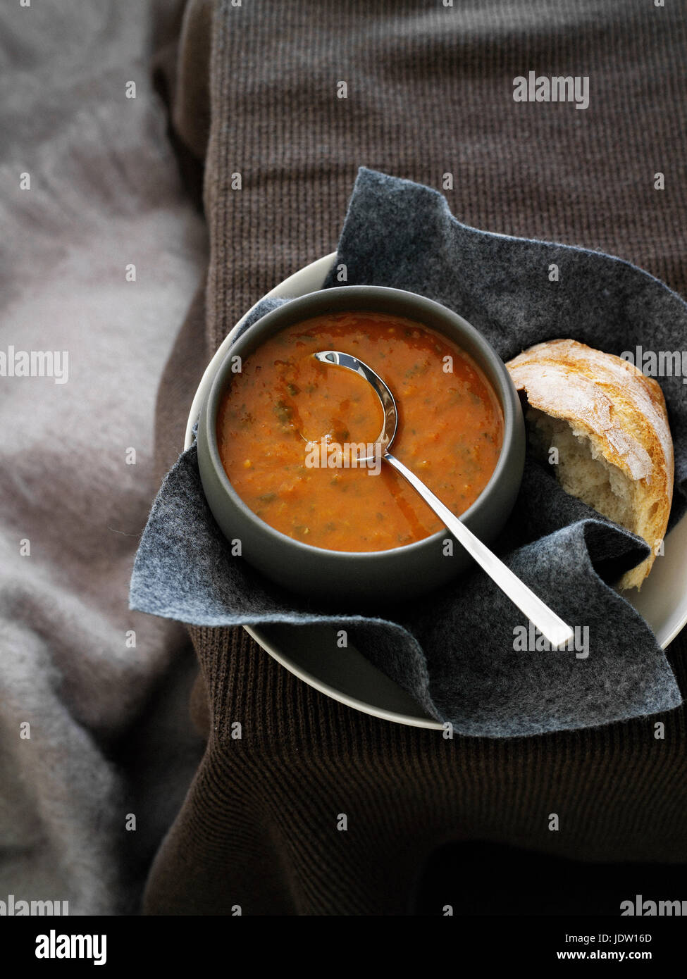 Bowl of soup with bread Stock Photo - Alamy
