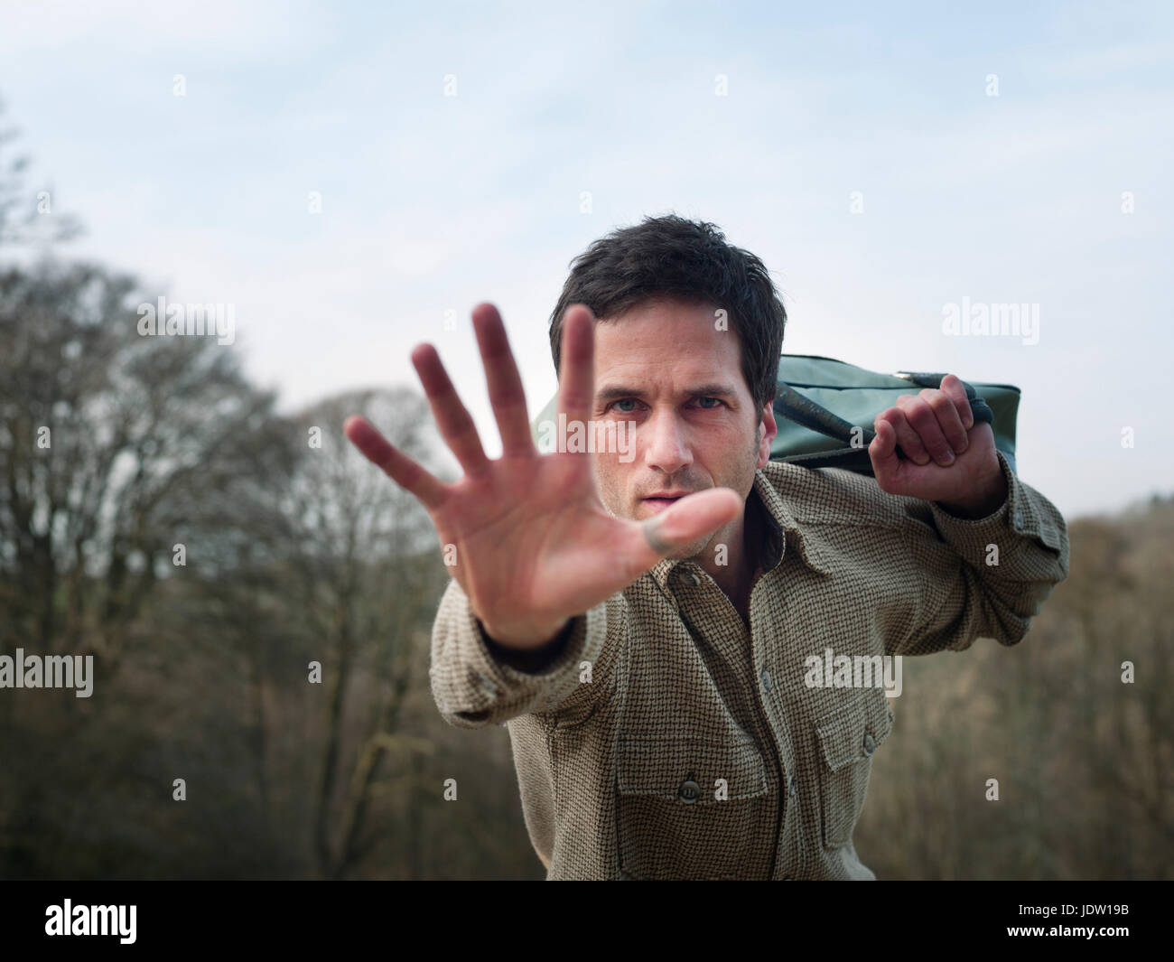 Hand blocking camera hi-res stock photography and images - Alamy