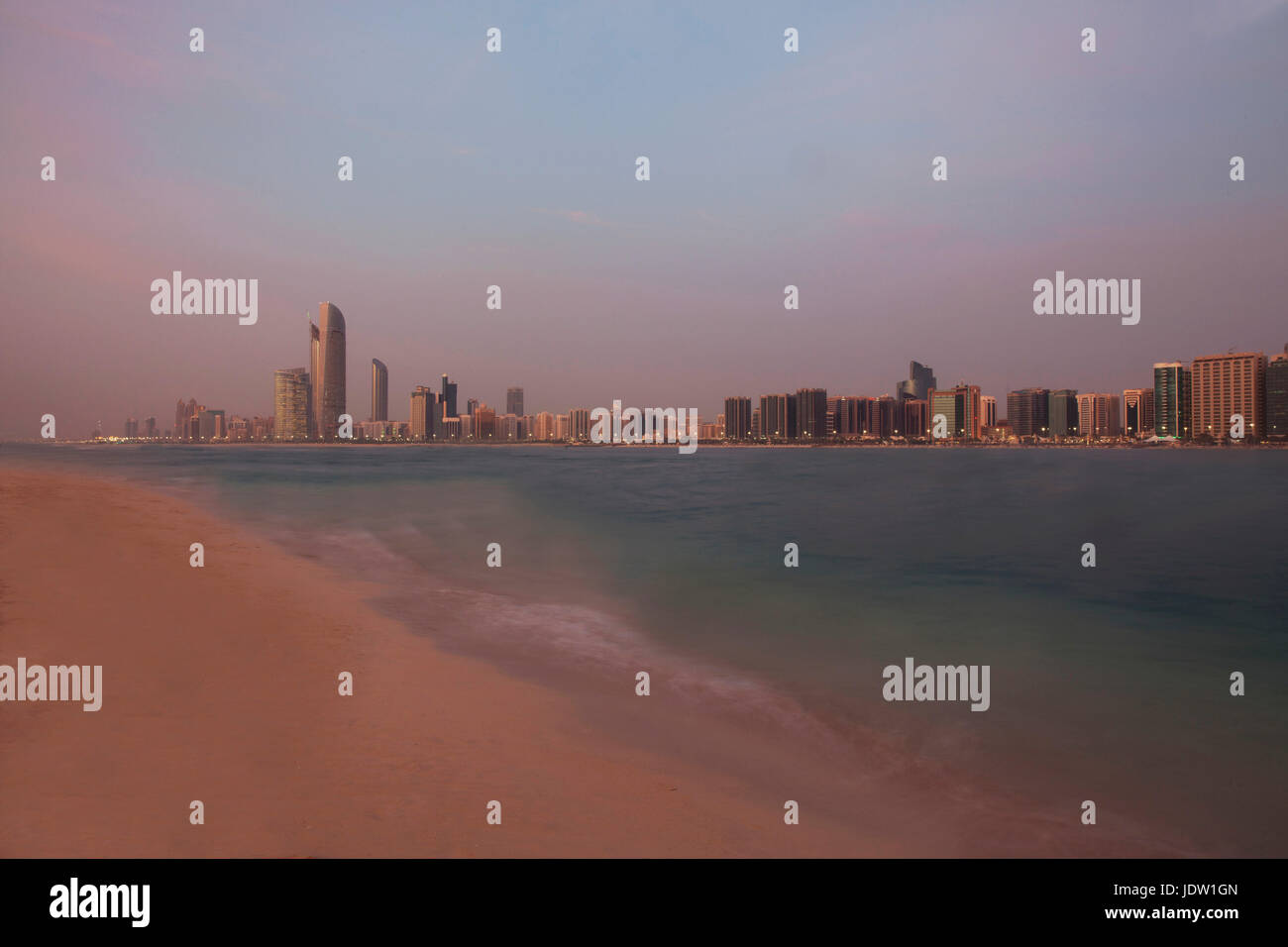 Urban skyline viewed from beach Stock Photo - Alamy
