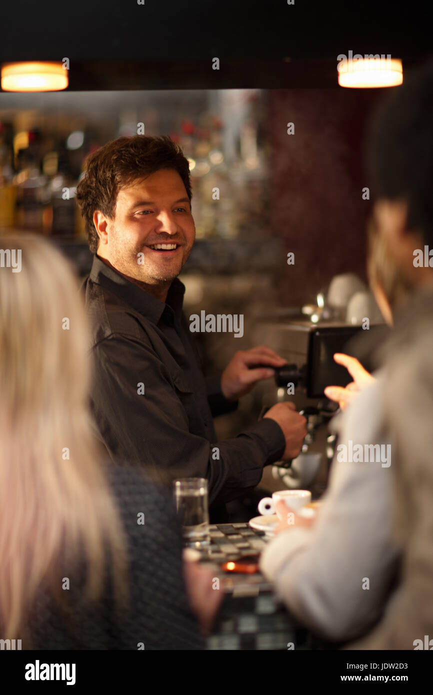 Ordering coffee counter barista hi-res stock photography and images - Alamy