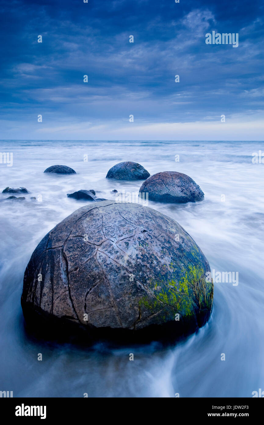 Graffiti on rock at beach Stock Photo - Alamy