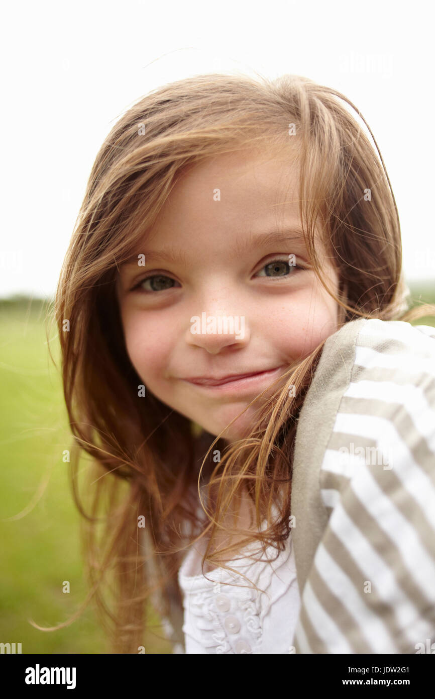 Close up of girl's smiling face Stock Photo - Alamy