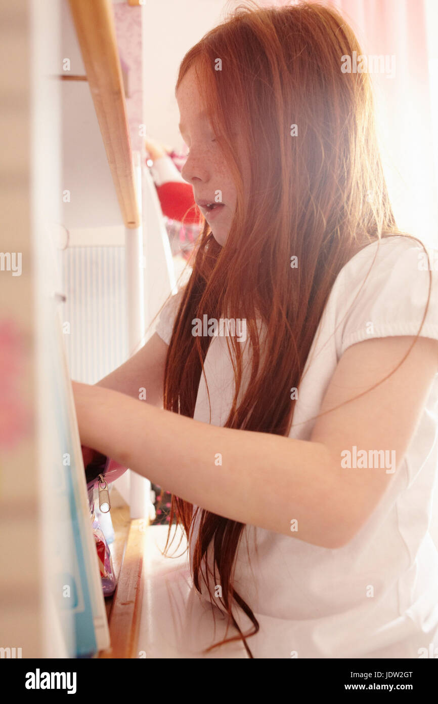 Rummaging hi-res stock photography and images - Alamy