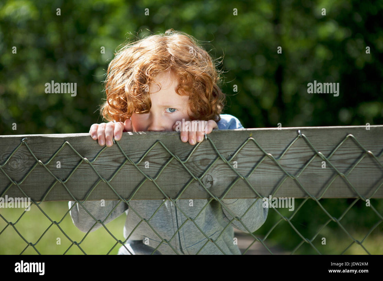 Girl on fence hi-res stock photography and images - Alamy