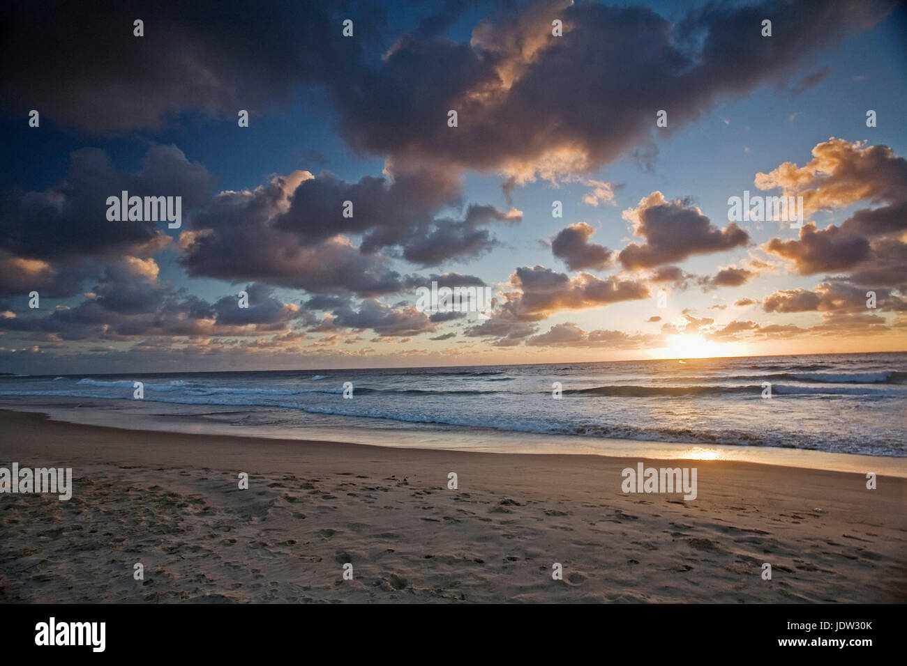 Beautiful setting sun beach hi-res stock photography and images - Alamy