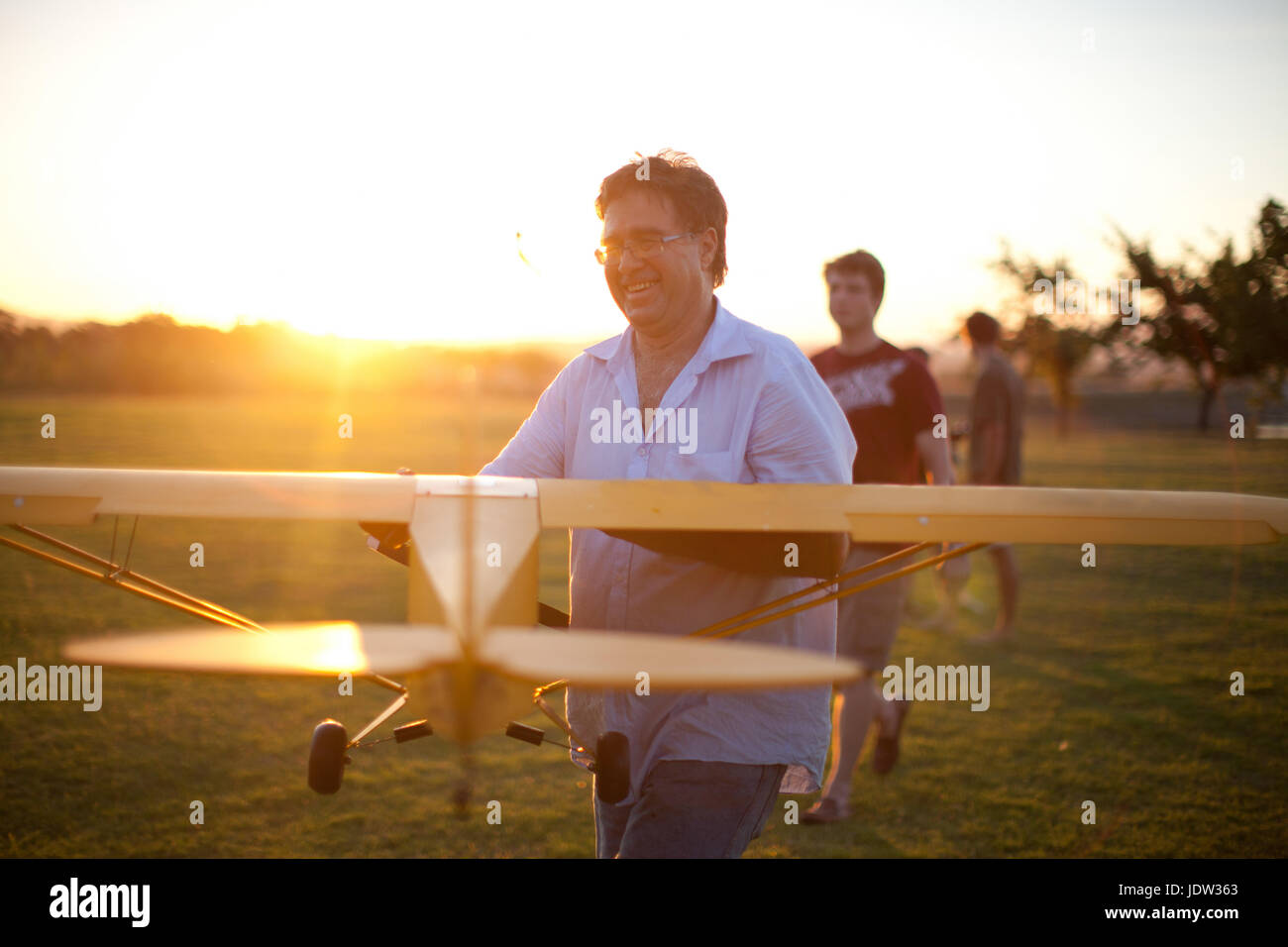 Father son park toy airplane hi-res stock photography and images - Alamy