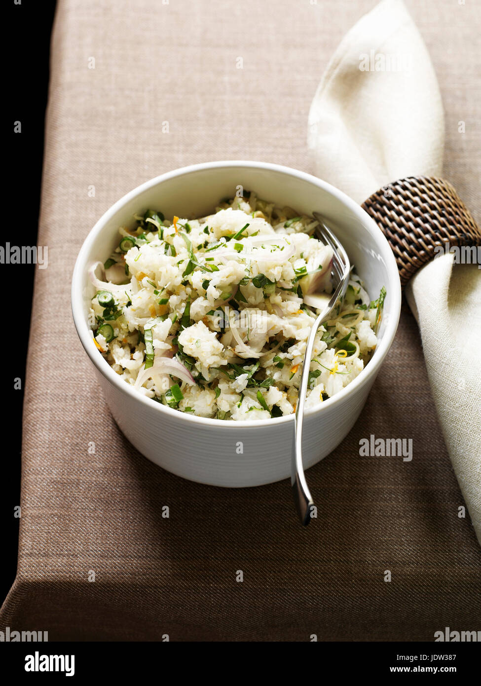 Bowl of rice and fish salad Stock Photo - Alamy