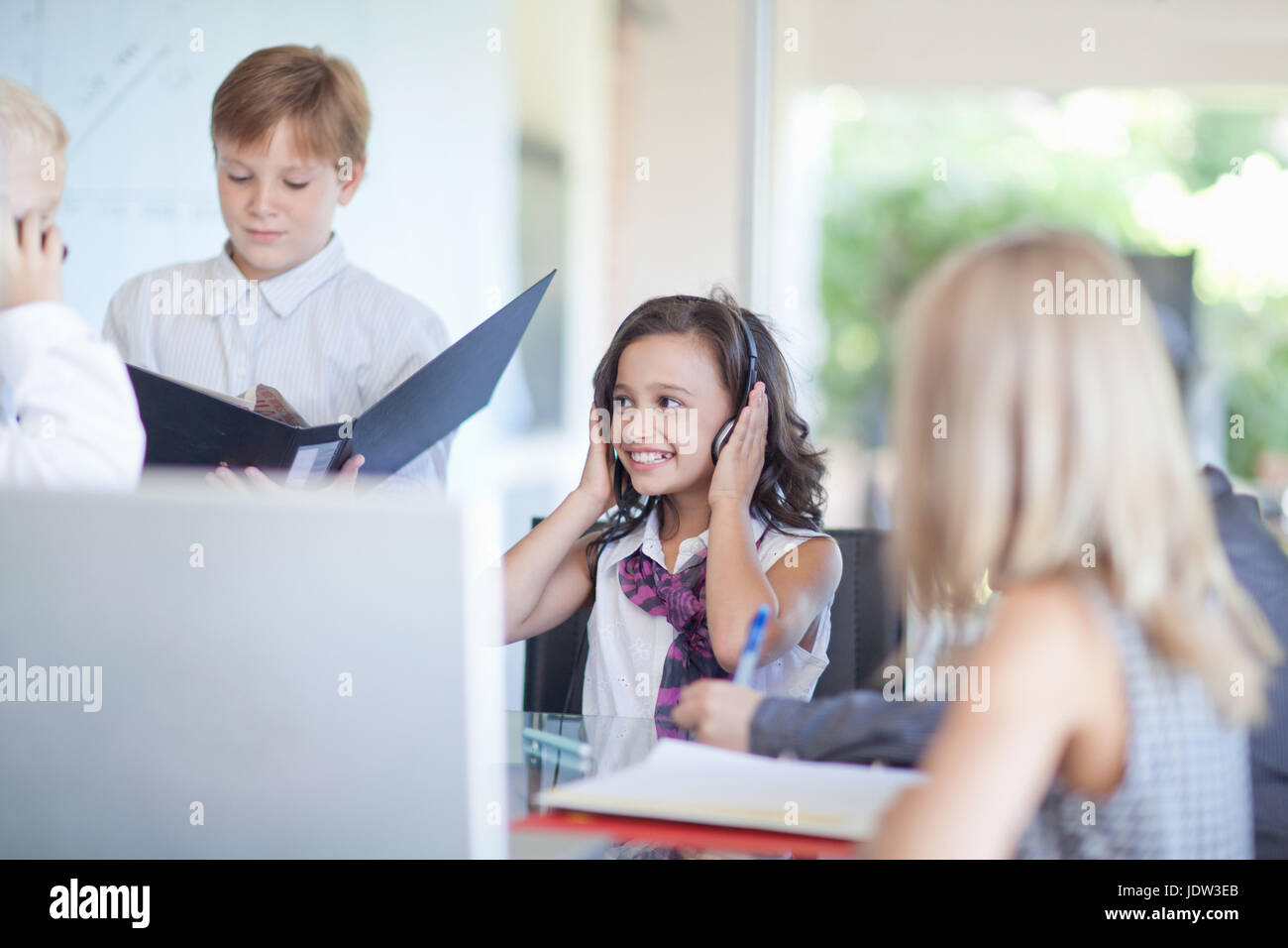 Boy girl office desk talking hi-res stock photography and images - Alamy