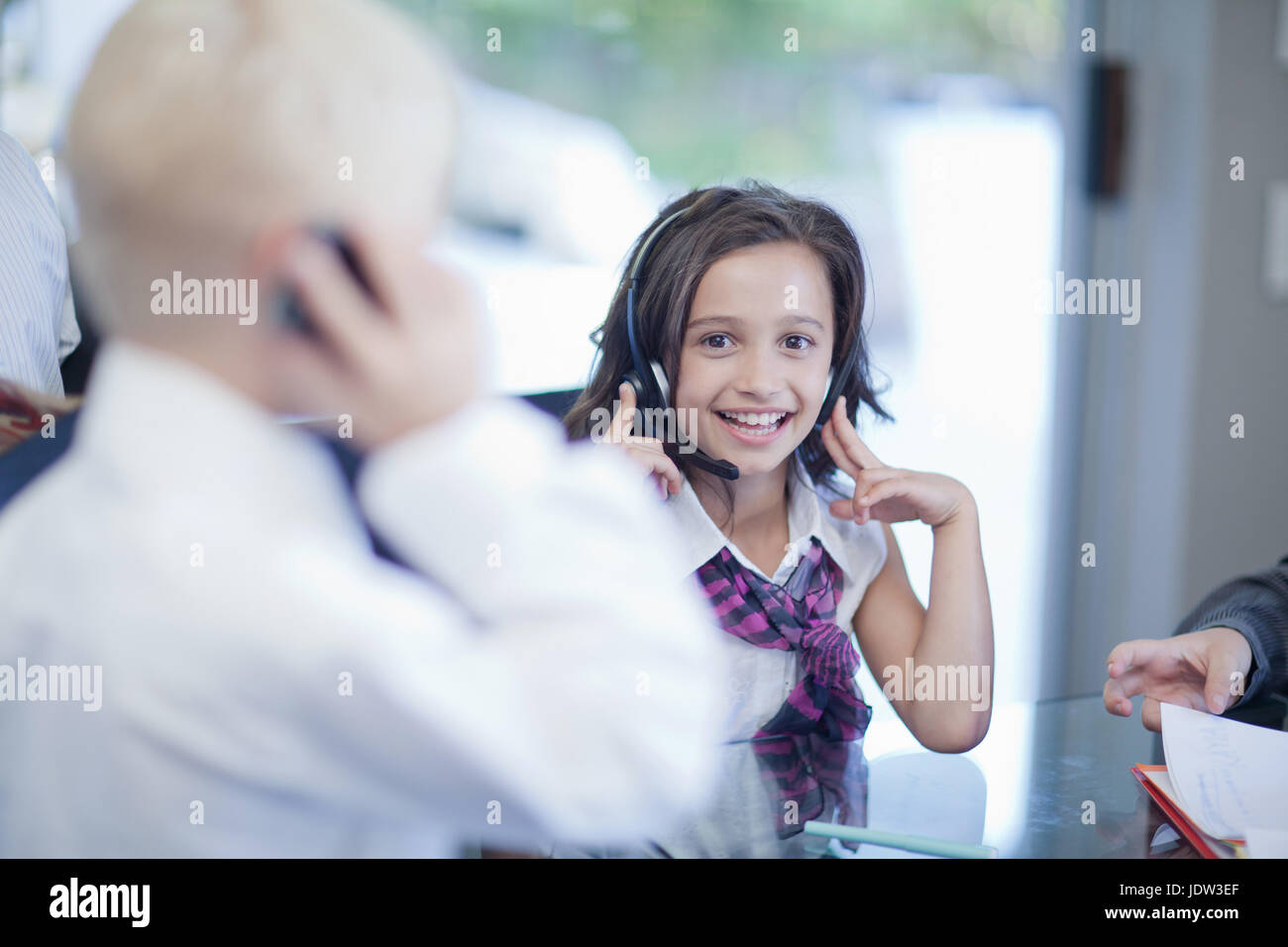 Children playing business people at desk Stock Photo - Alamy