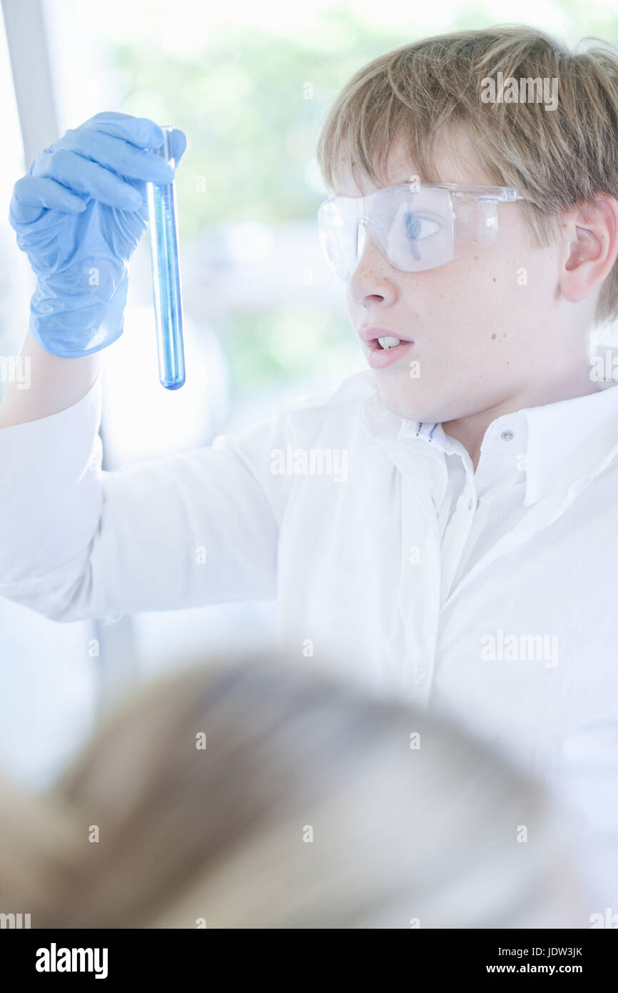Boy playing scientist in lab Stock Photo - Alamy