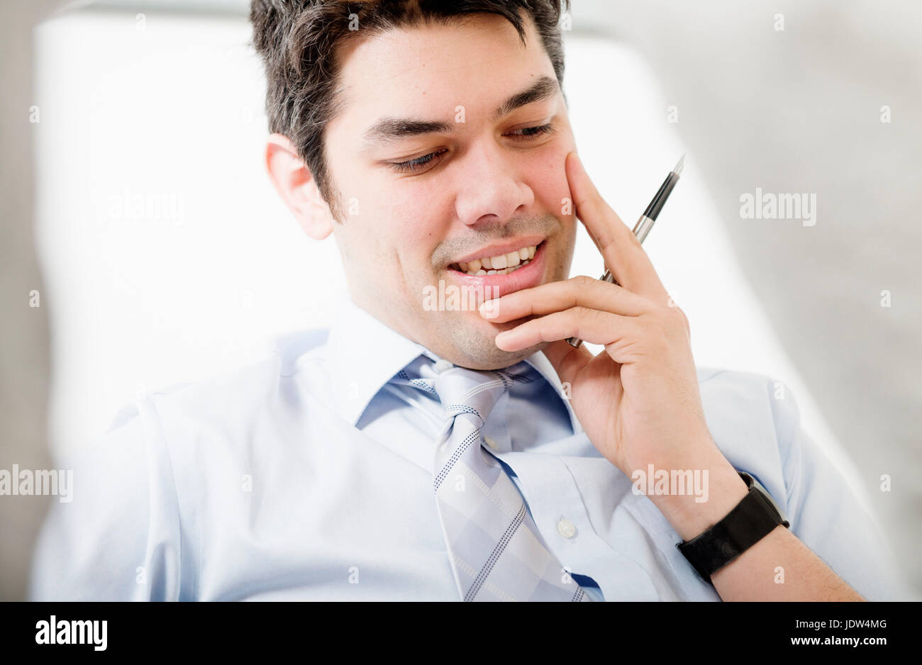 Portrait of man holding pen Stock Photo - Alamy Portrait of man holding pen Stock Photo - Alamy