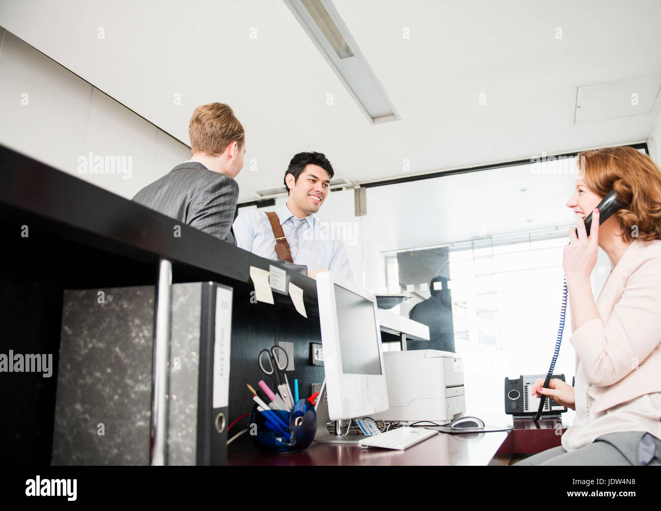 Business receptionist men 30 years hi-res stock photography and images ...