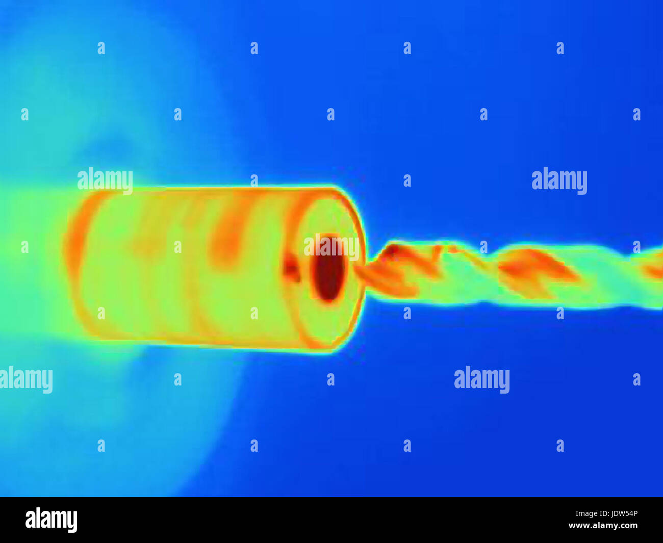 Thermal image of drilling into a component, showing the heat buildup on ...