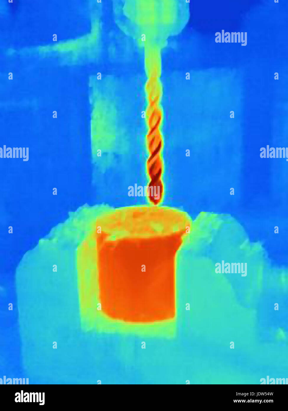 Thermal image of drilling into a component, showing the heat buildup on ...
