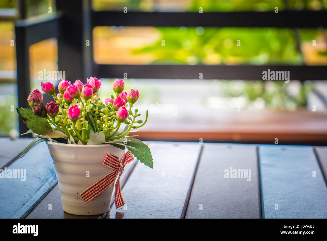Pink flower vase put on the table Have background blurred Stock Photo ...