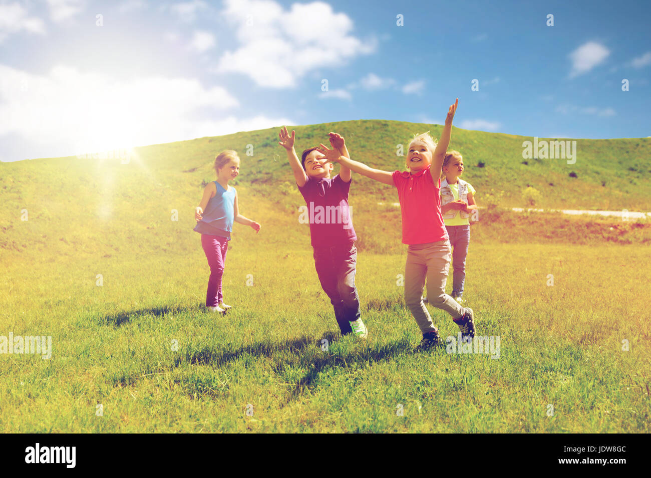 group of happy kids running outdoors Stock Photo - Alamy group of happy kids running outdoors Stock Photo - Alamy