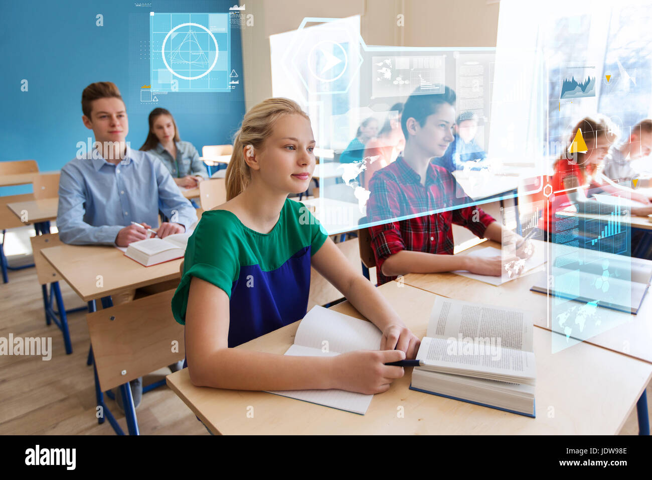 group of students with books at school lesson Stock Photo - Alamy