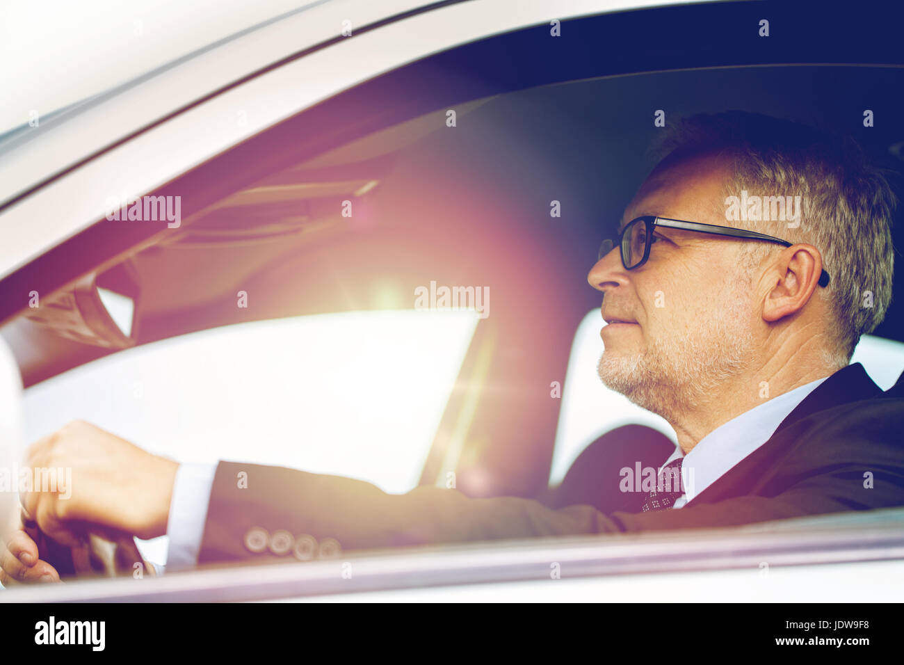 Old person driving hi-res stock photography and images - Alamy