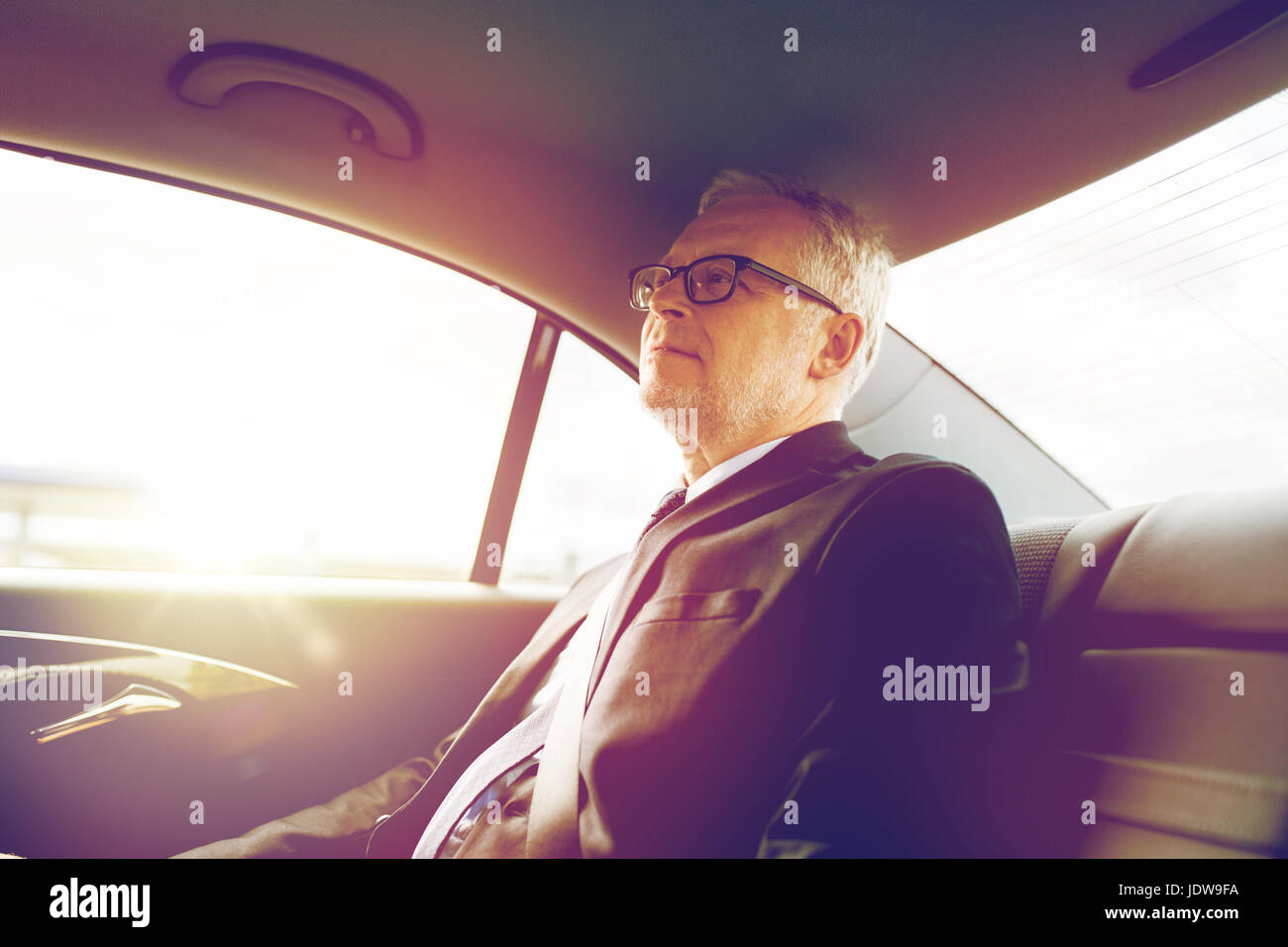 Businessman sitting on motor hi-res stock photography and images - Alamy