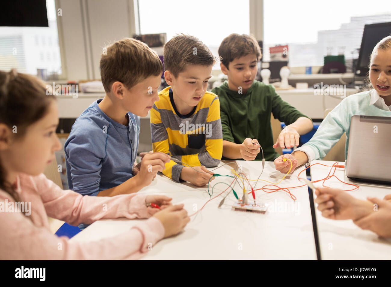 kids with invention kit at robotics school Stock Photo - Alamy