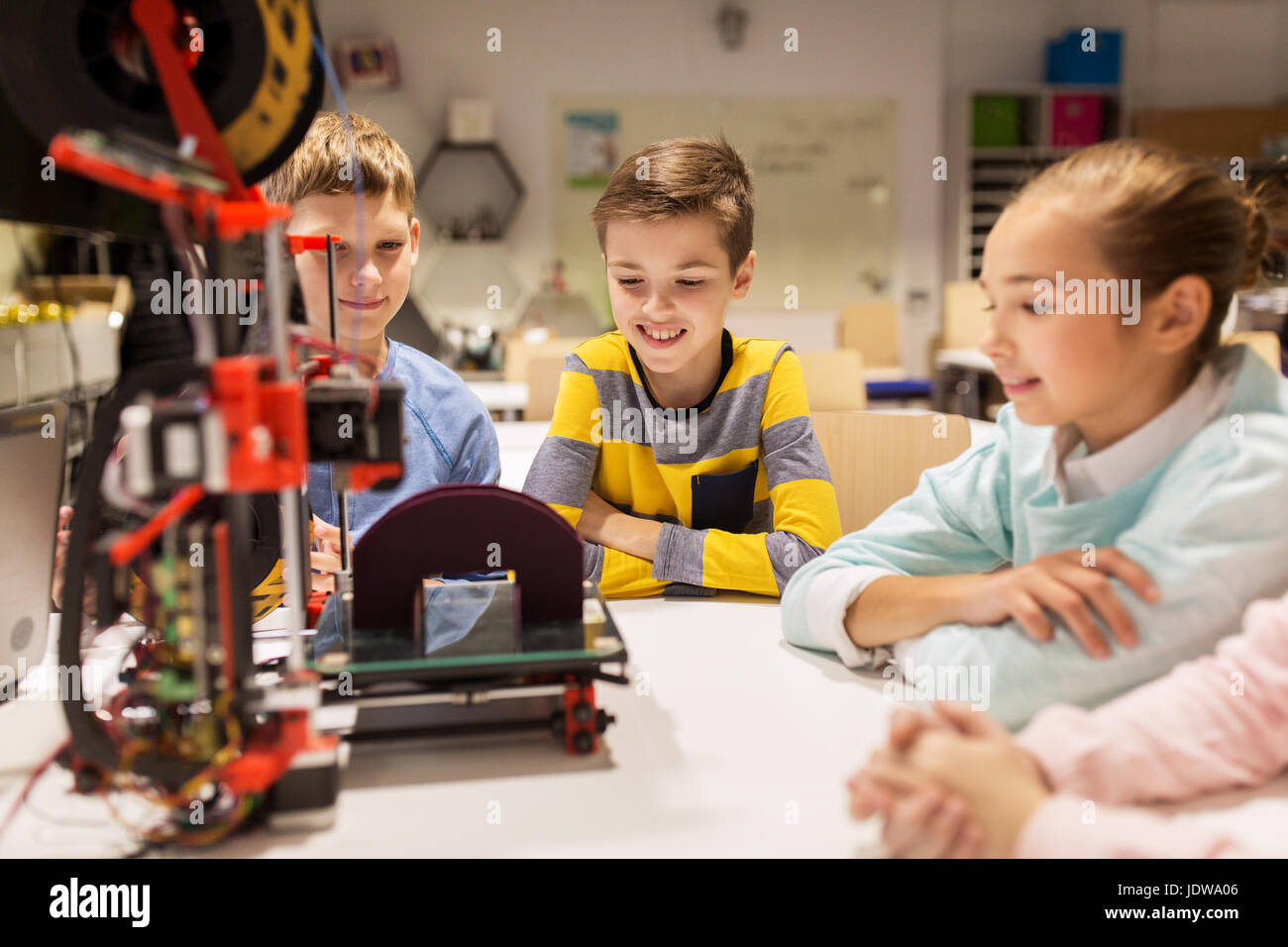 happy children with 3d printer at robotics school Stock Photo - Alamy