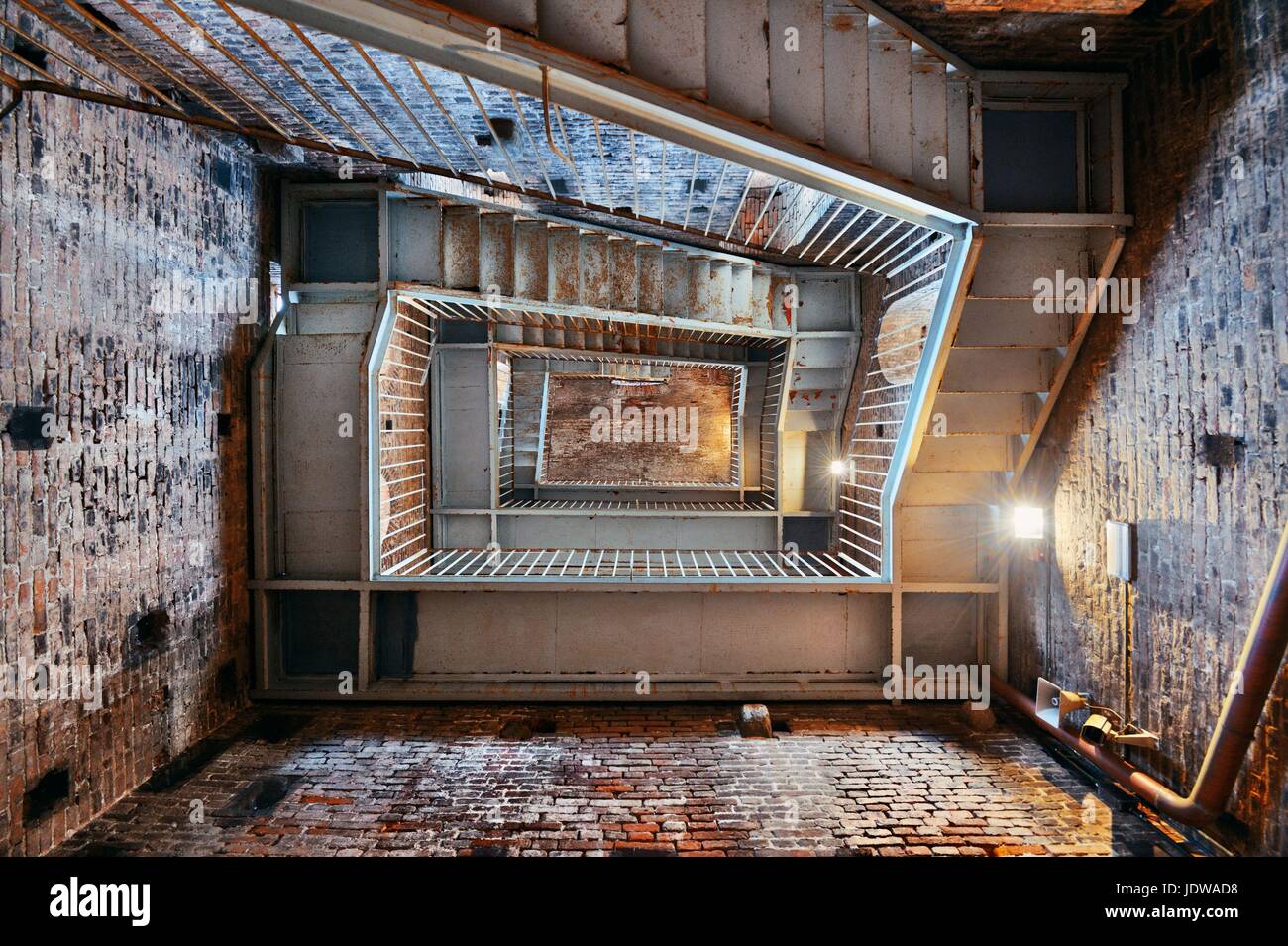 Staircase inside clock tower in Lucca with historic buildings in Italy ...