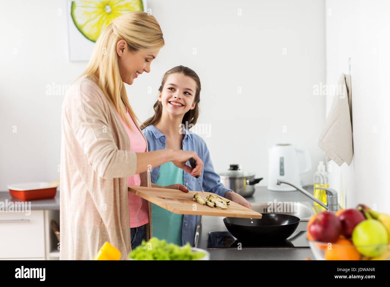 happy family cooking food at home kitchen Stock Photo - Alamy