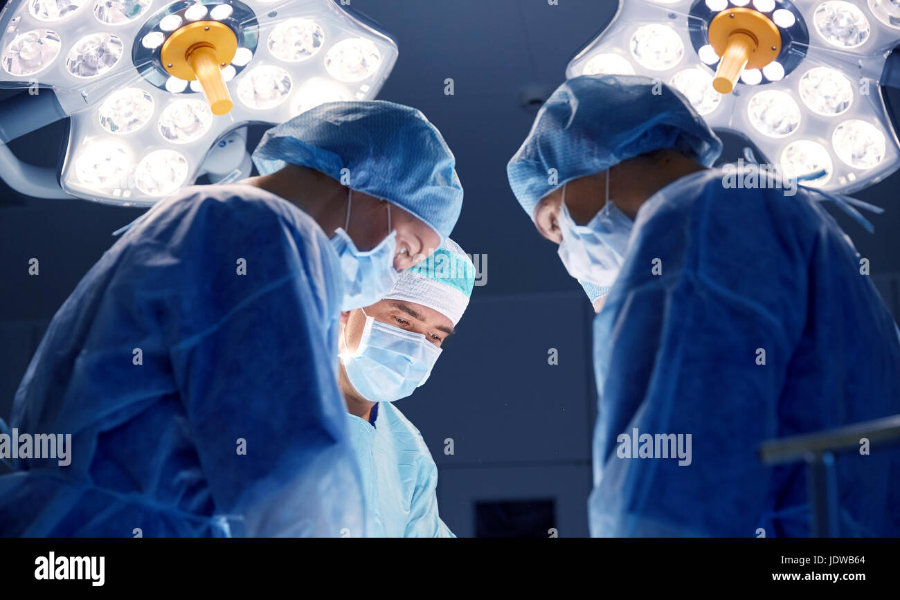 group of surgeons in operating room at hospital Stock Photo - Alamy
