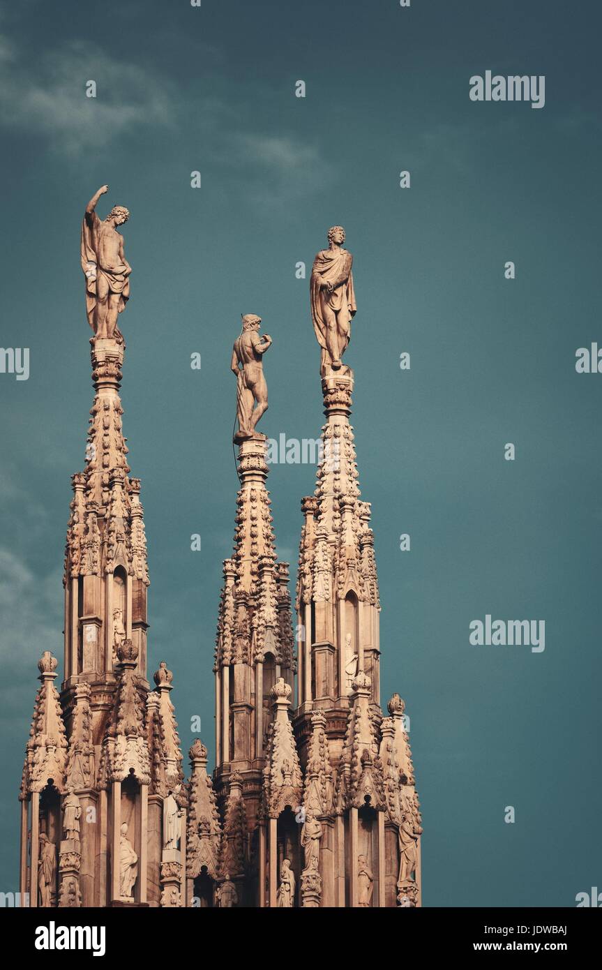 Statue on top of Cathedral in the center of Milan city in Italy Stock ...
