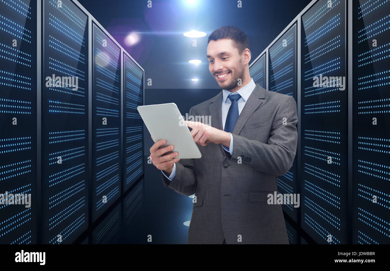businessman with tablet pc over server room Stock Photo - Alamy