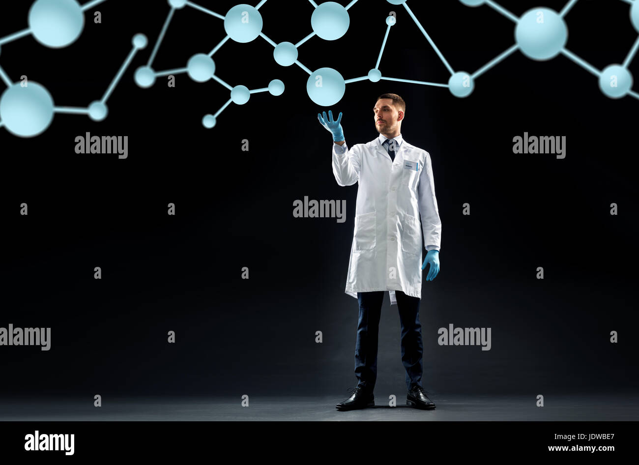 scientist in lab coat with molecules Stock Photo - Alamy