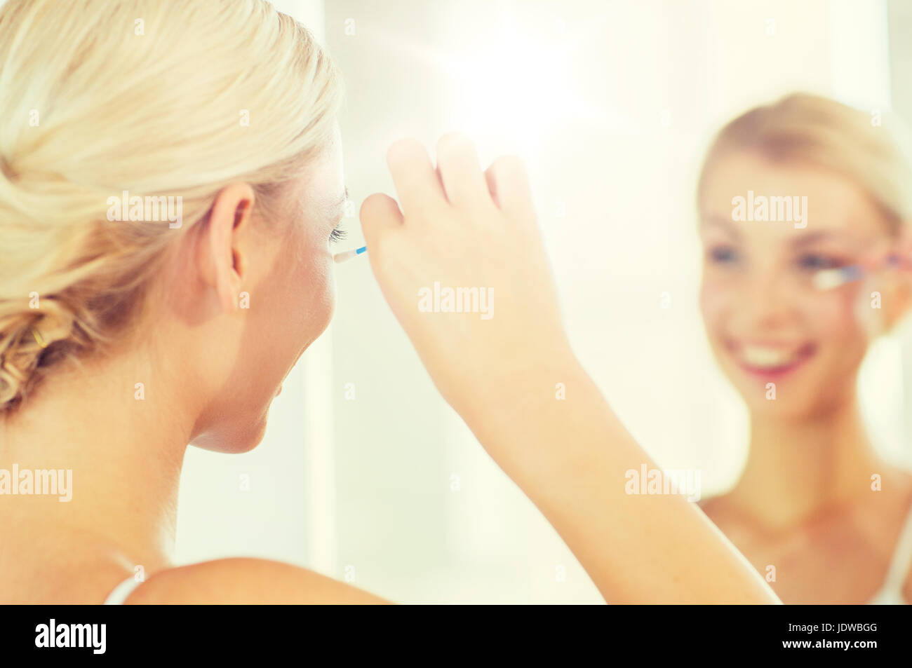 Fixing eye makeup hi-res stock photography and images - Alamy