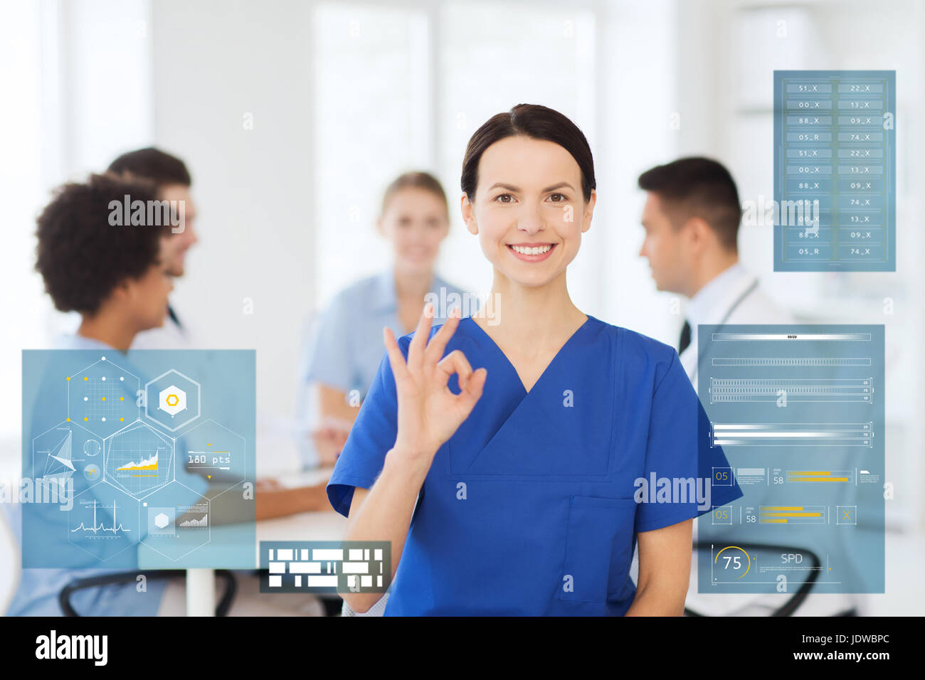 happy doctor at hospital showing ok hand sign Stock Photo - Alamy