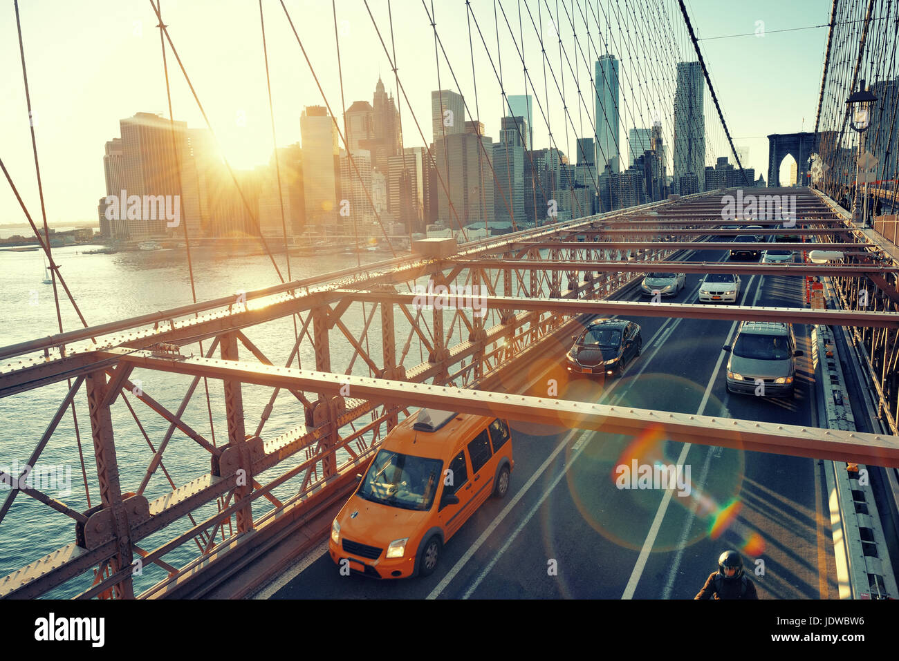 Brooklyn Bridge with traffic in downtown Manhattan New York City Stock ...