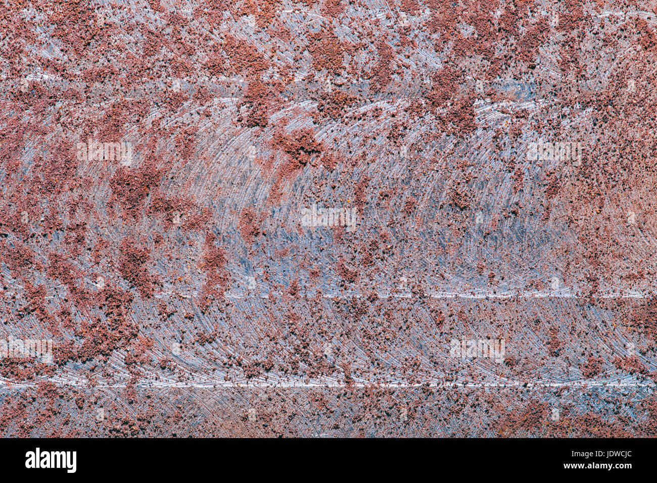 The metal texture is covered with a layer of rust. Metal background ...