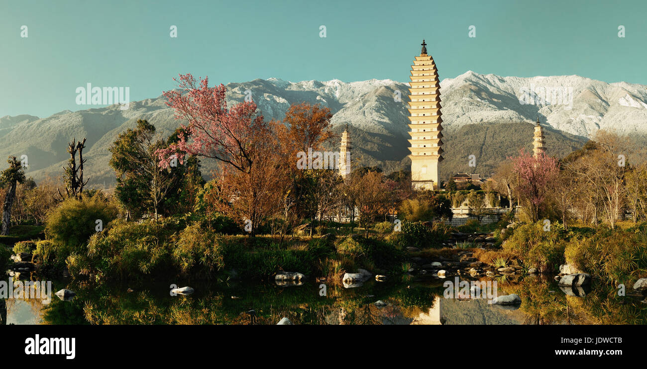 Ancient pagoda in Dali old town with snow capped Mt Cangshan, Yunnan ...