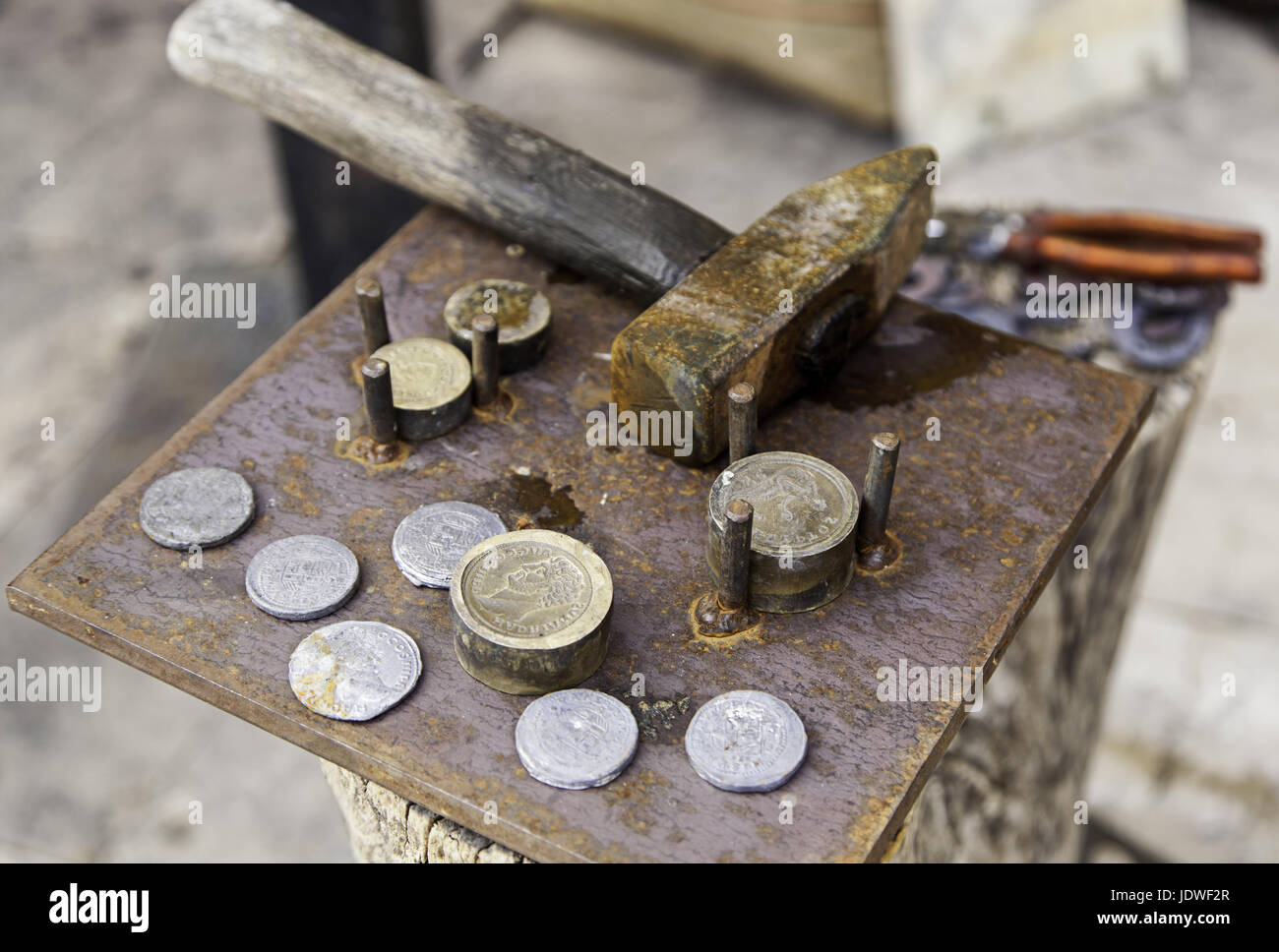 Making handmade coins, handicraft work detail, antiquity Stock Photo ...