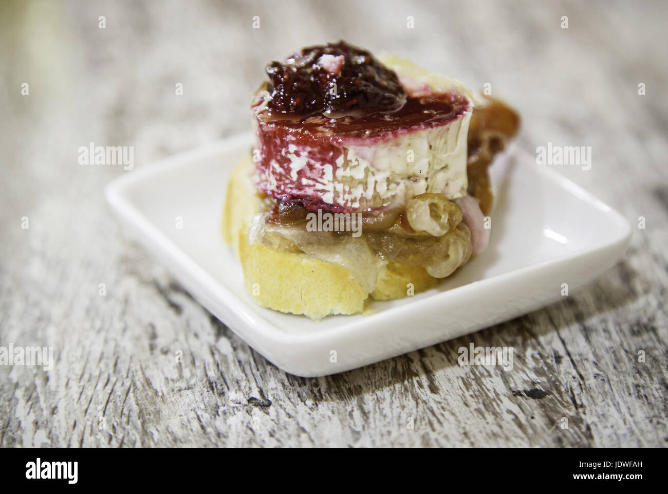 Goat cheese and raspberry, gourmet appetizer detail, haute cuisine ...