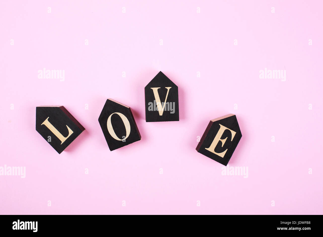 Word LOVE on wooden cubes Stock Photo - Alamy