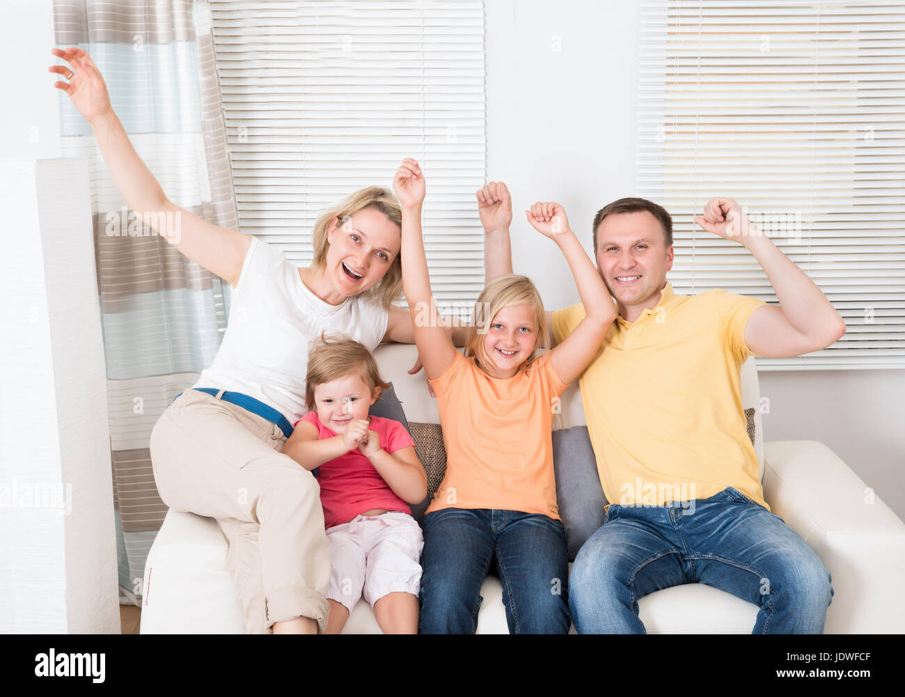 Children cheering on their dad hi-res stock photography and images - Alamy