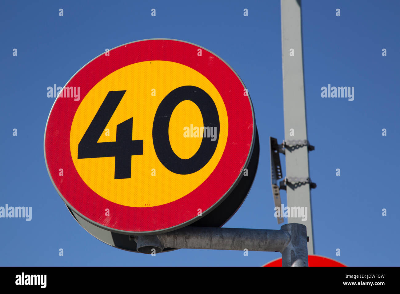 Forty Speed Traffic Sign against Blue Sky Background Stock Photo - Alamy